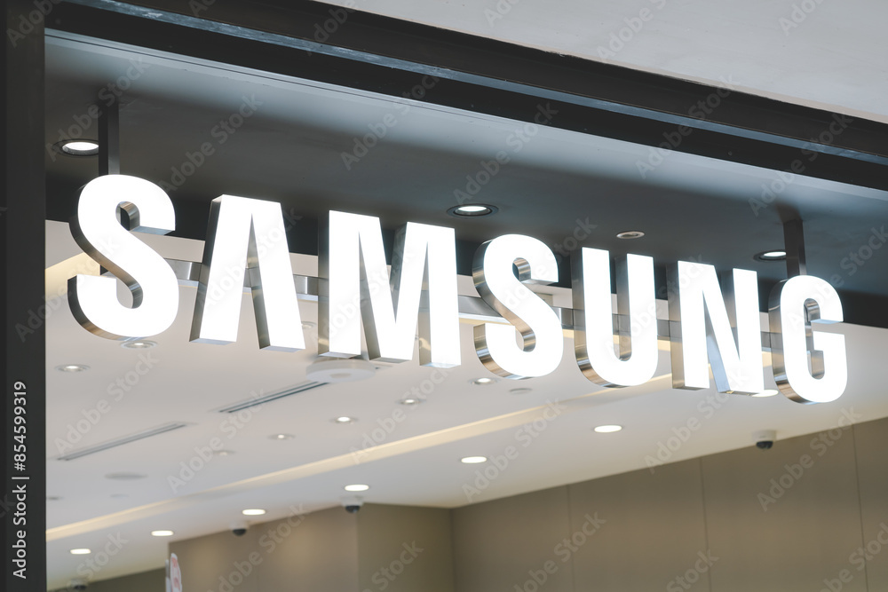 Samsung tech brand lettering logo in shopping mall. It is South Korea ...