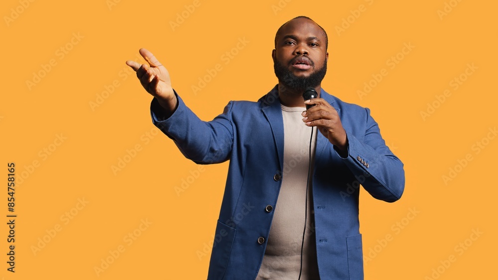 African american motivational speaker holding monologue using ...