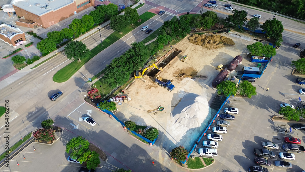 Busy street intersection fuel station construction at corner of ...
