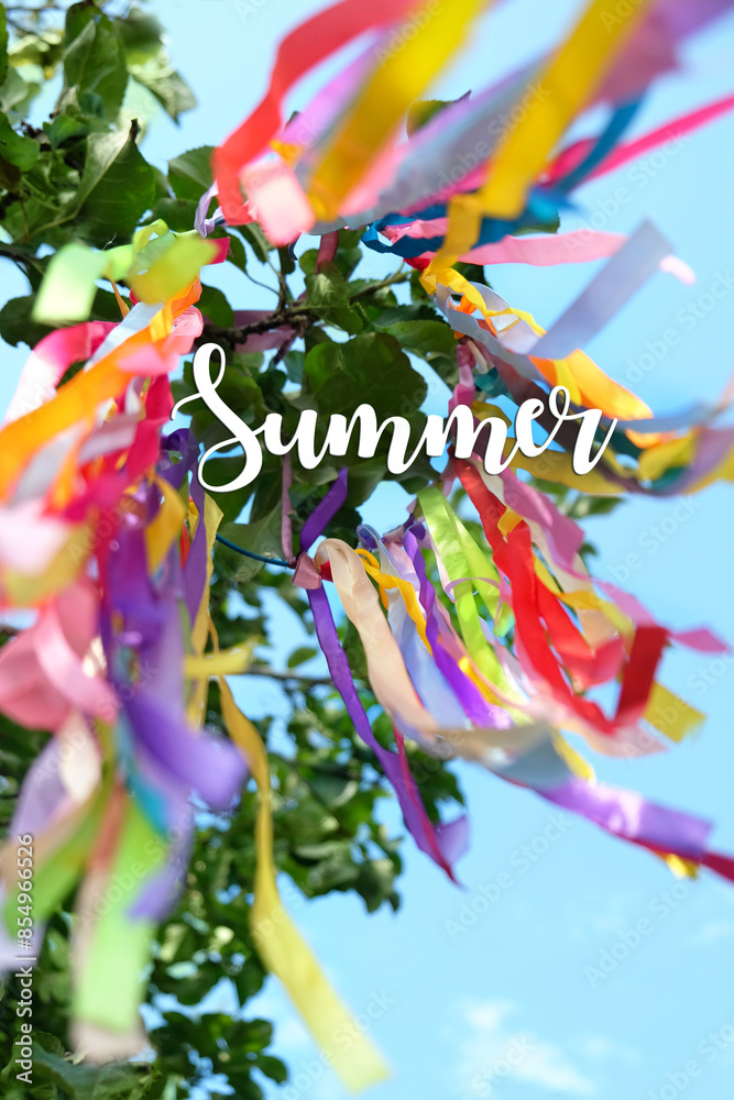 Summer background concept. wreath of bright colorful ribbons in garden ...