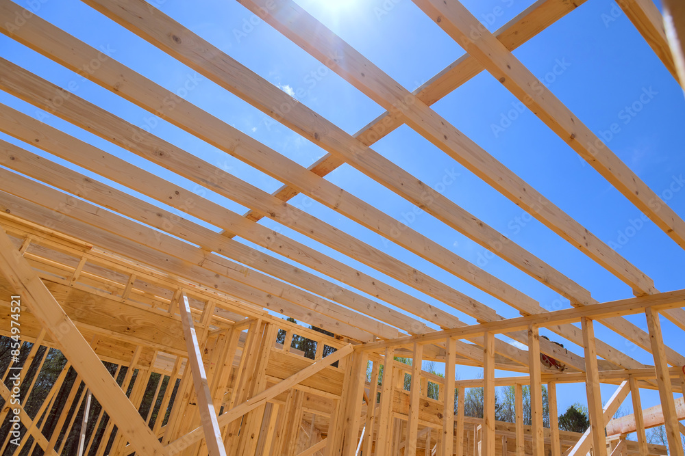 An installation ceiling roof trusses, framework beams, rafters was ...