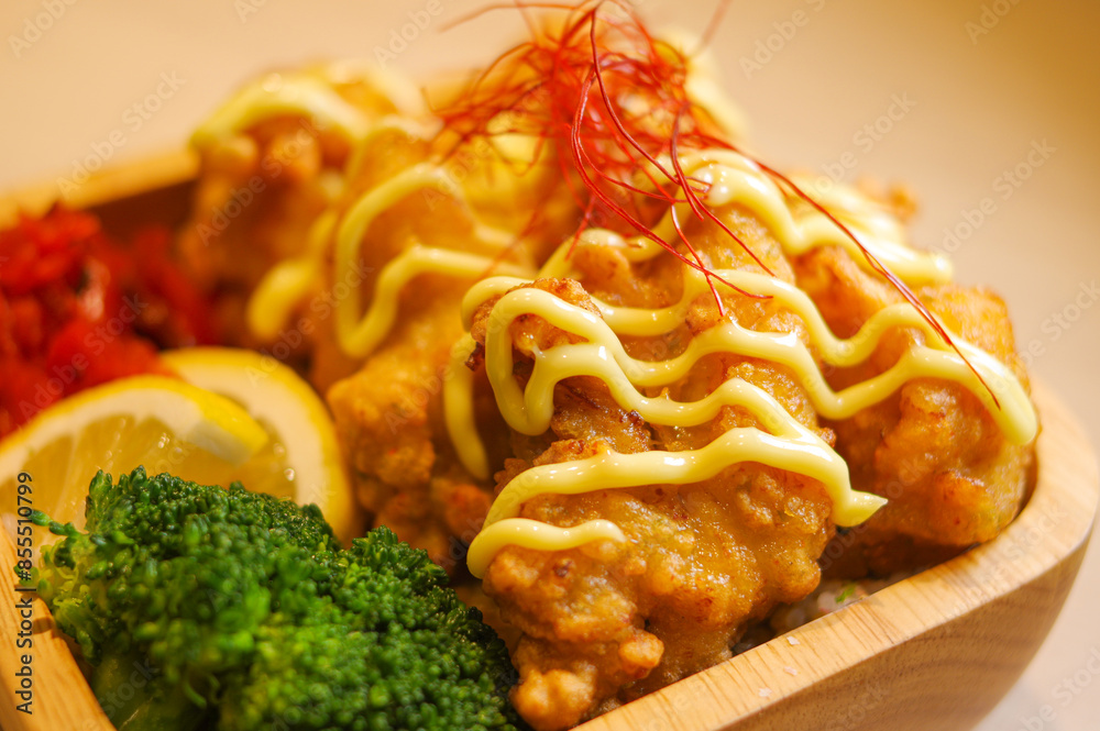 fried chicken karaage with mayonnaise deep-fried fish finger close up ...