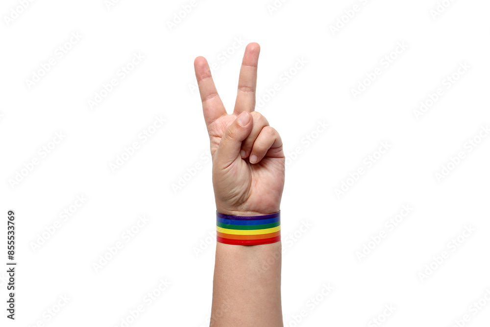 Hand with bracelet with the rainbow colors of the gay flag, a symbol ...