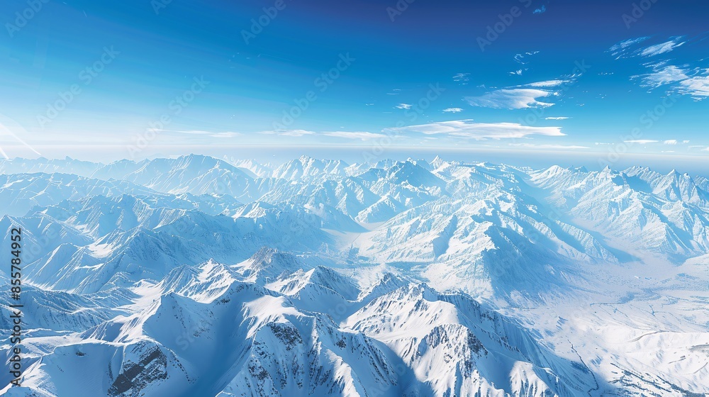 A realistic photograph of a snowy mountain range captured from a high ...
