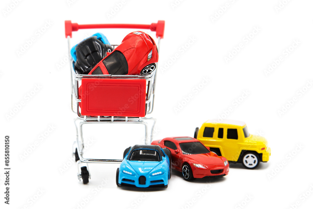 Car shopping. Supermarket shopping cart with a set of various luxury ...