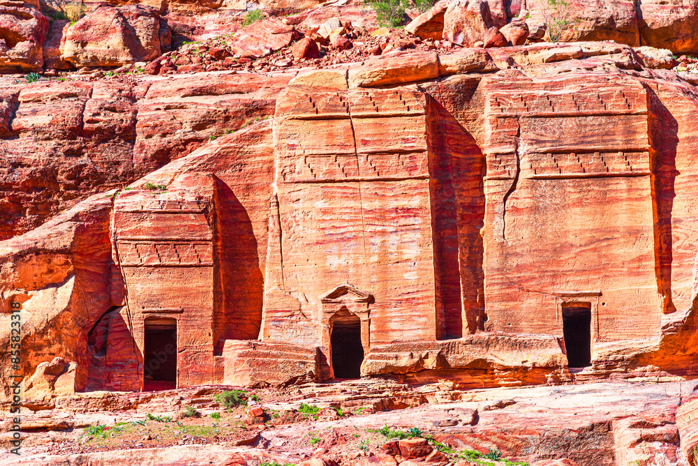 Wadi Musa, Jordan: Facades of old rock houses in ancient Petra, Jordan ...