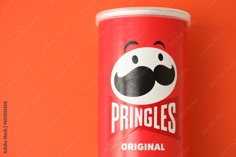 KYIV, UKRAINE - APRIL 20, 2024 Pringles original potato chips on red ...