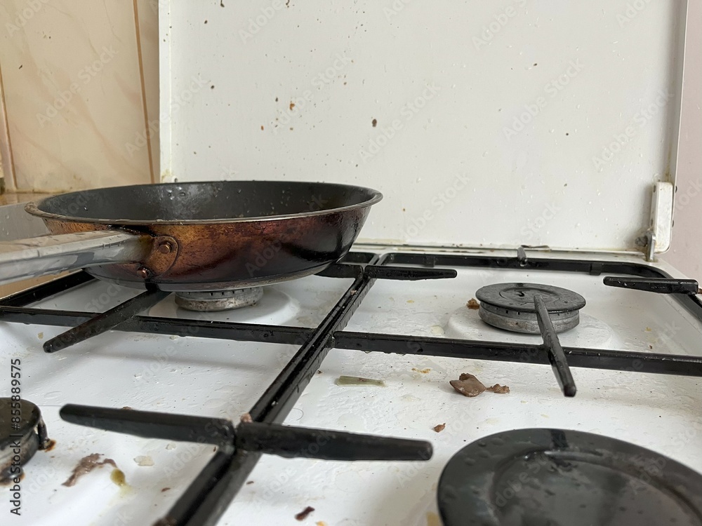Dirty gas stove cooking oil stains on gas stove with stainless steel ...