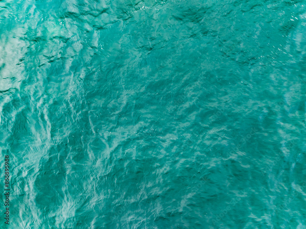 Aerial view of a blue sea surface water texture background,Sun ...