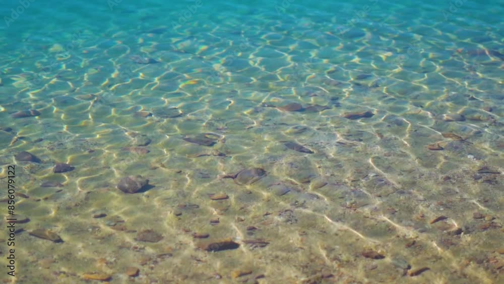 Slow motion shot of water ripples on the Chandra Taal Lake near Kunzum ...