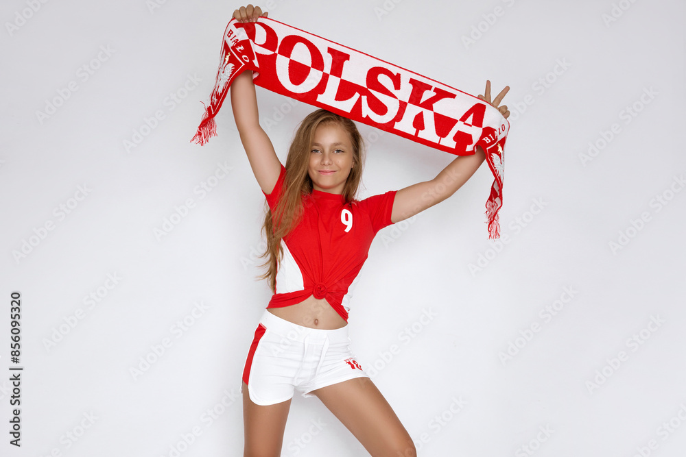 Polish young happy girl in sports outfit hold the Polish red and white ...