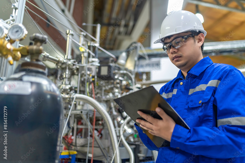 Asian engineer working at Operating hall,Thailand people wear helmet ...