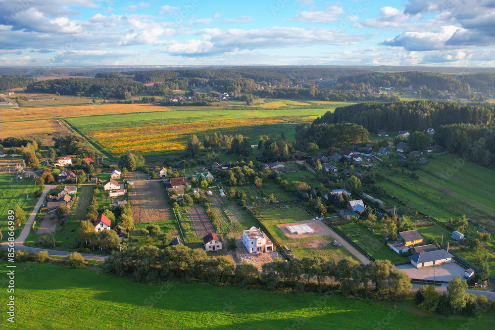 Country houses in countryside, aerial view. Rural landscape. Village ...
