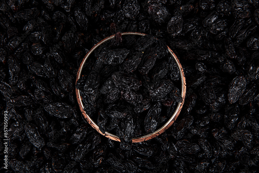 Black raisins with seeds (sultana), dried fruits. Dried black raisins ...