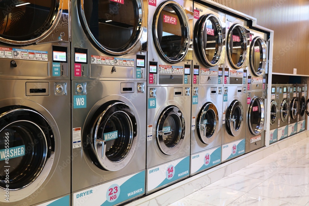SINGAPORE CITY, SINGAPORE - MARCH 11, 2024: Self-service laundry in ...