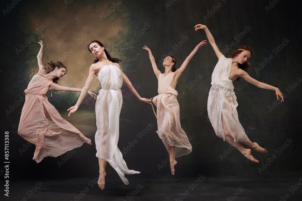 Beautiful girls, ballerinas leaping gracefully in motion, as ...