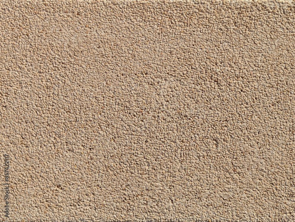 Light beige amd cream gravel or washed stone and concrete block or tile ...