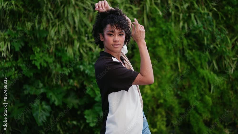 young woman dancing gracefully in slow motion, capturing fluidity and ...