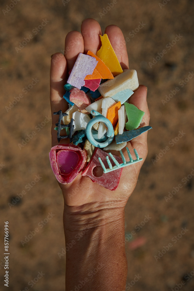 Coastal Micro Plastic Pollution held in a hand from Hawaii Beaches ...
