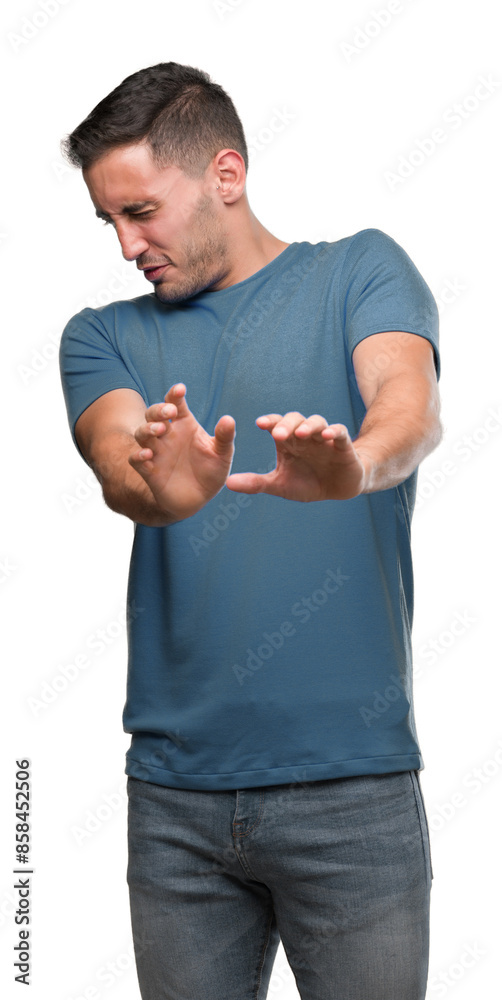 Handsome young casual man disgusted expression, displeased and fearful ...