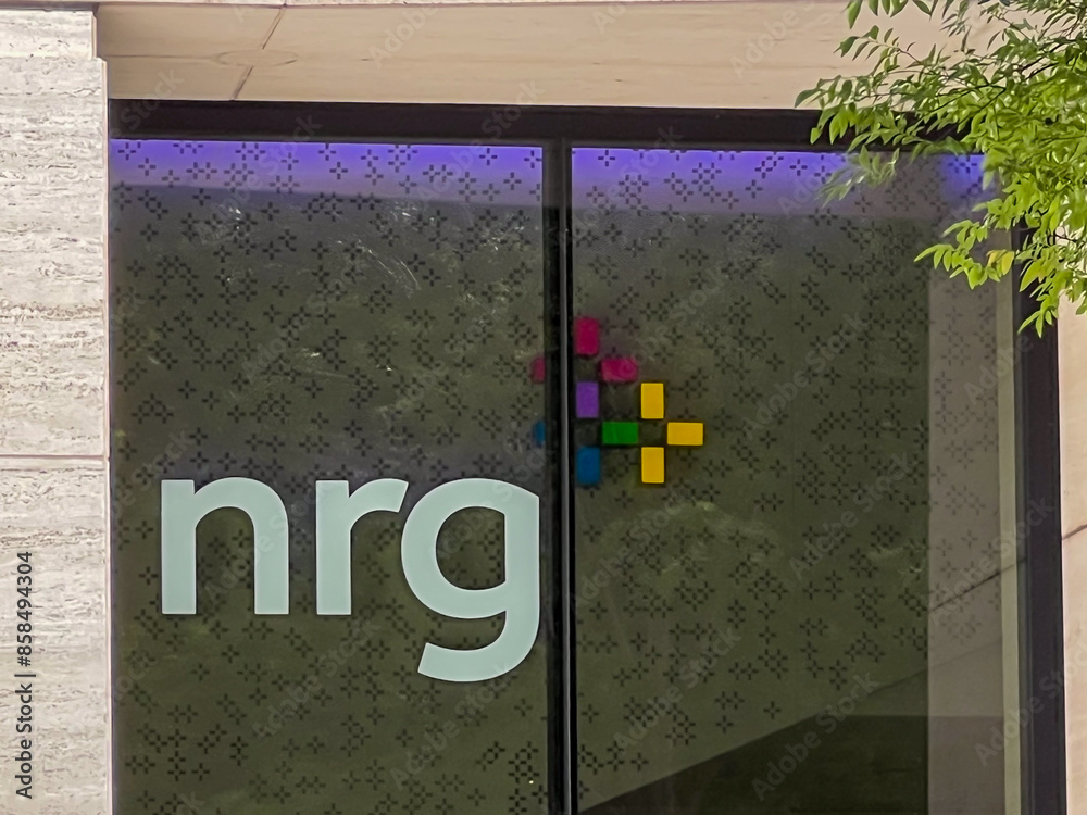Houston, Texas, USA - April 4, 2024: NRG logo sign in its headquarters ...