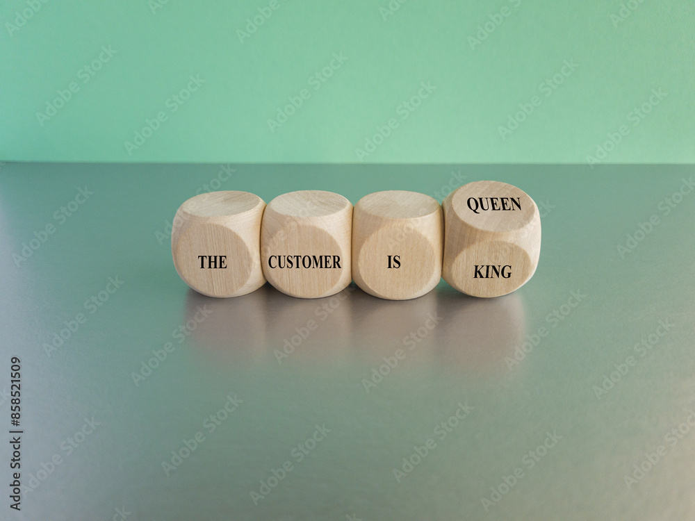 Customer is king or queen symbol. Turned a wooden cube and changes the ...