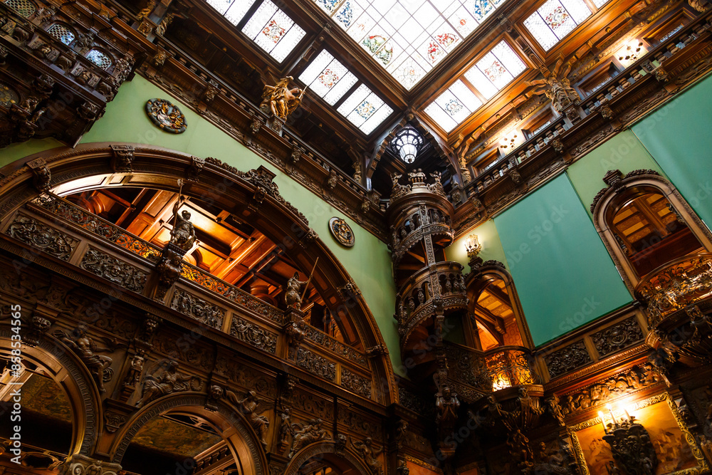 Sinaia, Romania - August 26, 2022: Wood-carved spiral staircase and ...