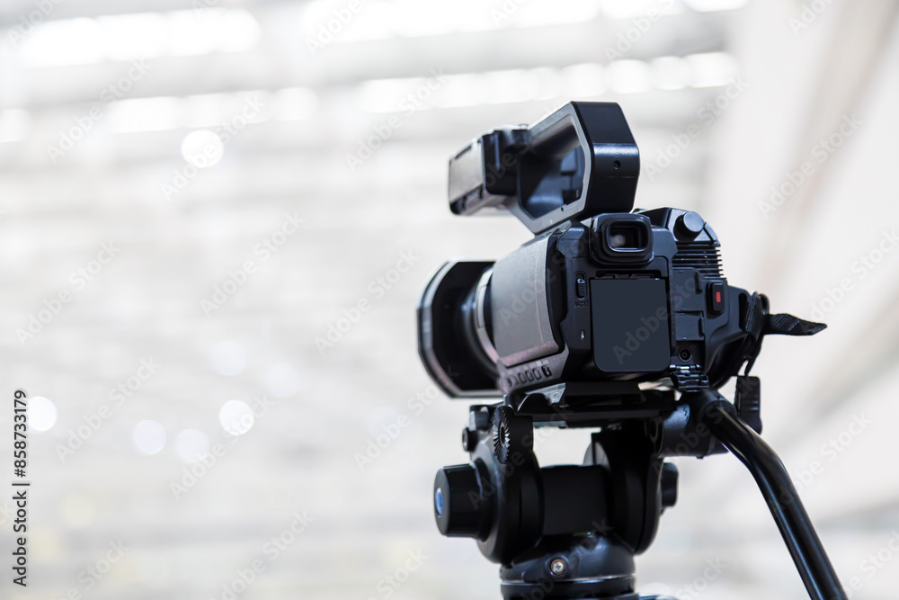 Video camera with blur background for journalist interview broadcasting ...