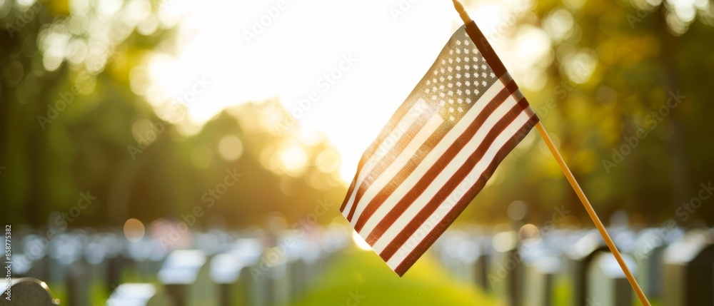 Patriotic Tribute: American Flag Waving in Military Cemetery on ...