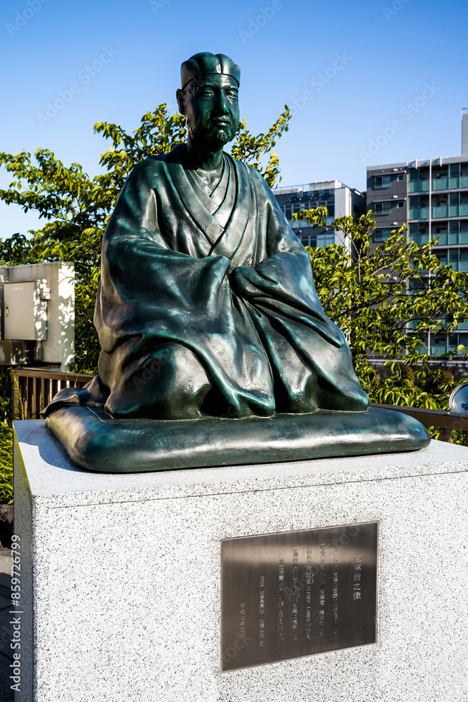 Statue of Japanese poet Matsuo Basho in the Basho Heritage Garden, in ...