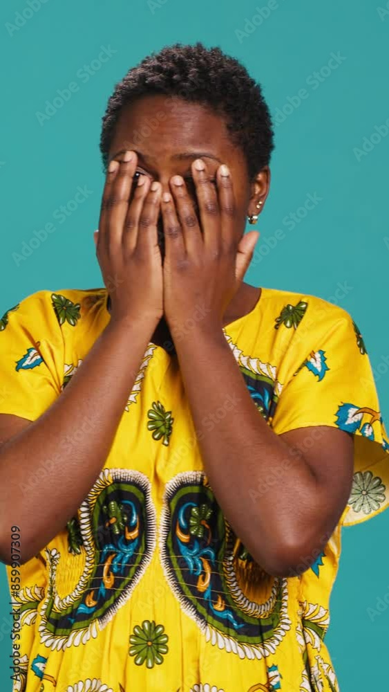 Vertical Video Distressed shocked person covering her eyes and being ...