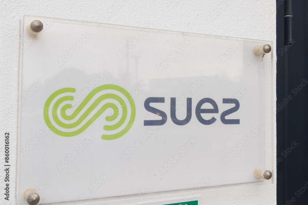 Suez logo text and sign French utility company water treatment and ...