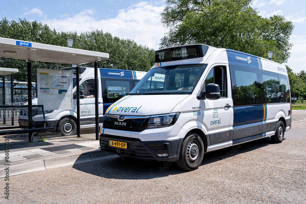 Schagen, Netherlands -June 6, 2024: Overal MAN TGE neighborhood bus ...
