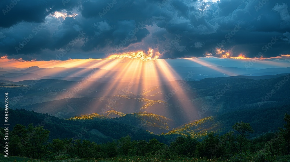 Beams of sunlight breaking through dark storm clouds, illuminating a ...