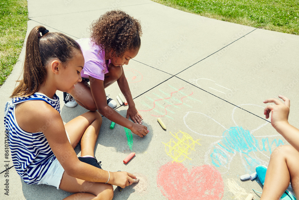 Girl, children and drawing on ground with chalk at school for learning ...