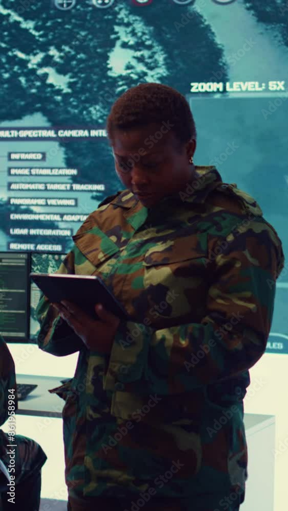Vertical Video Female military officer supervising radar surveillance ...