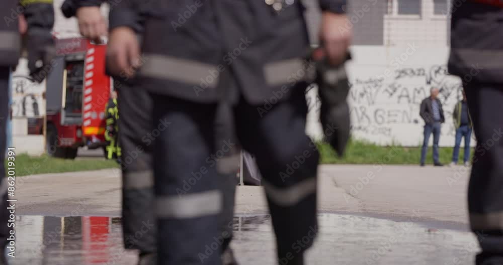 A specialized firefighting unit equipped with special attire and ...