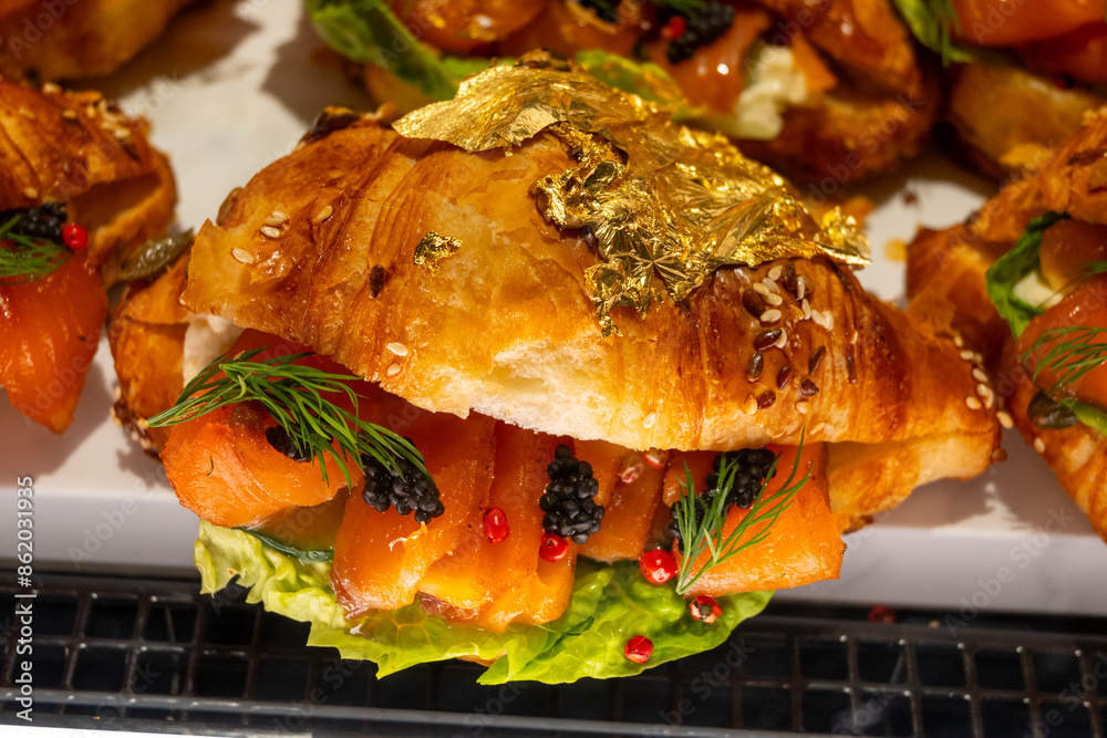 Butter puff croissants on display in artisanal bakery in London, filled ...