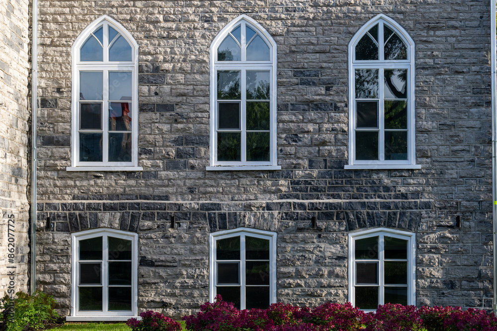 A historical concrete building, Gothic Revival style of architecture ...