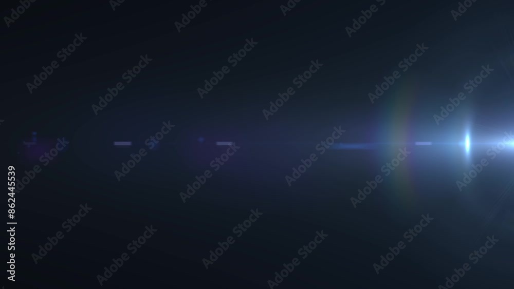 This is a high-quality, royalty-free stock video of a bright blue lens ...