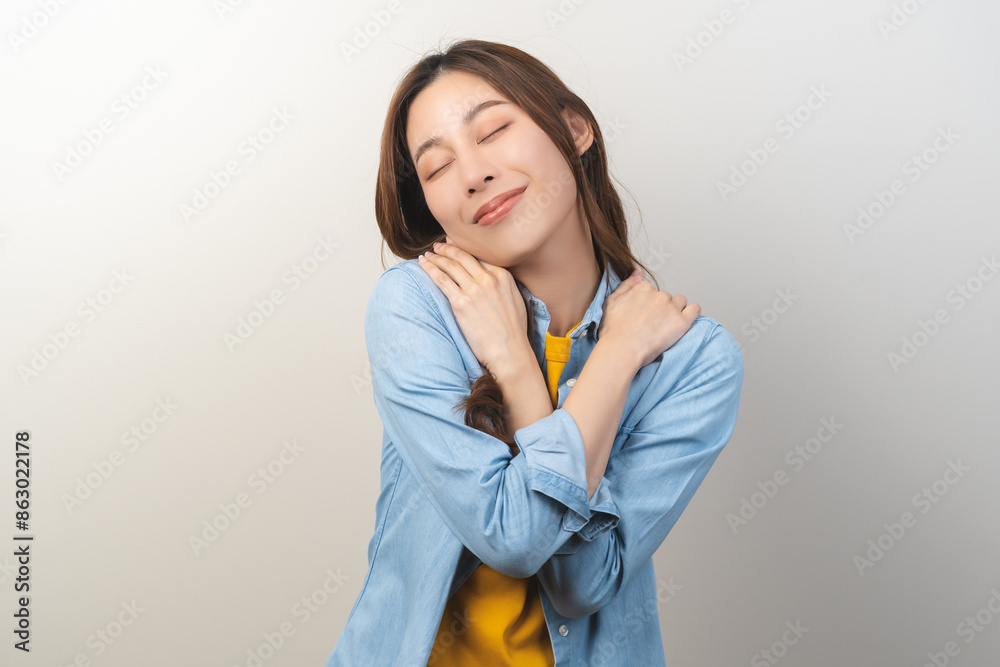 Smiling positive, hug self care happy asian young woman hands hugging ...