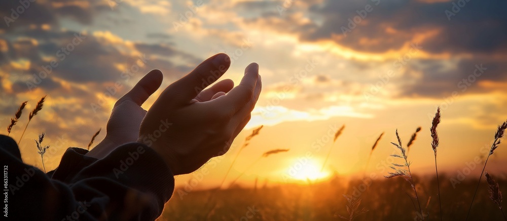 Hands reaching over to the sky in pray. Prayer raises his hands to ...