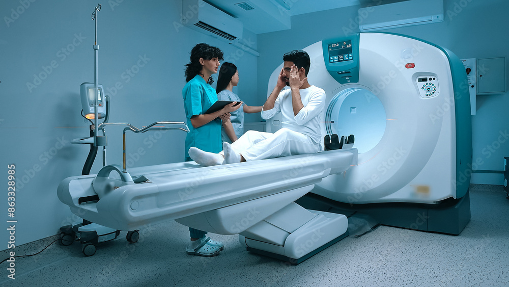 Radiologist discussing results of x-ray scan with patient. Magnetic ...