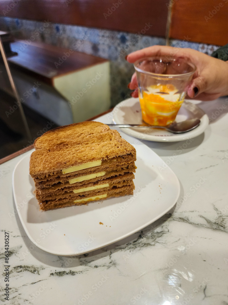 Kaya toast butter and half egg boiled. Traditional oriental and vintage ...