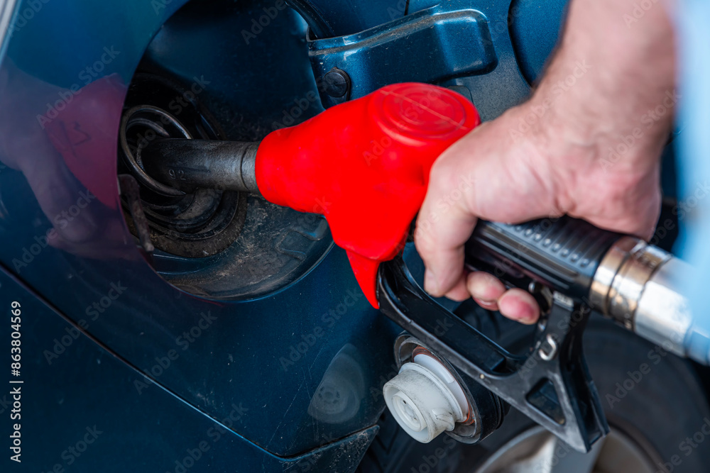 person filling tank Hand Man Refill and filling Oil Gas Fuel at station ...
