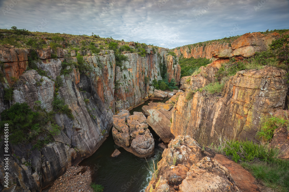 Rock formation in Bourke's Luck Potholes, Bridge over Bourke's Luck ...