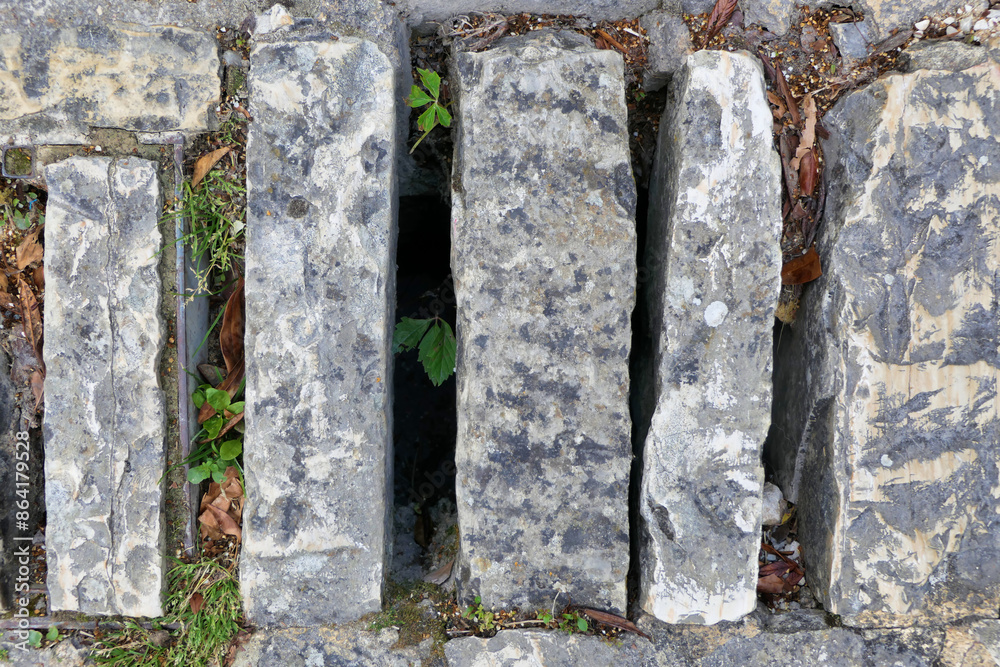 Medieval stone drainage grid found in a road in the French town of ...