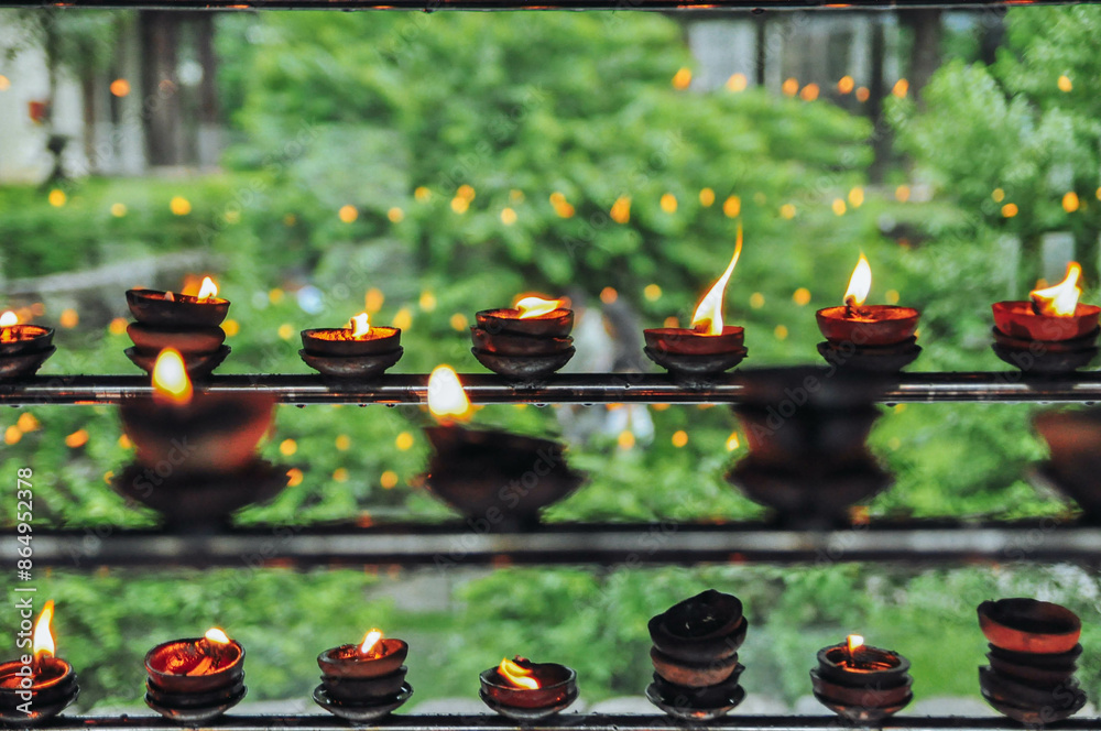 Traditional Clay Oil Lamps Lit At The Buddhist Temple In Sri Lanka ...