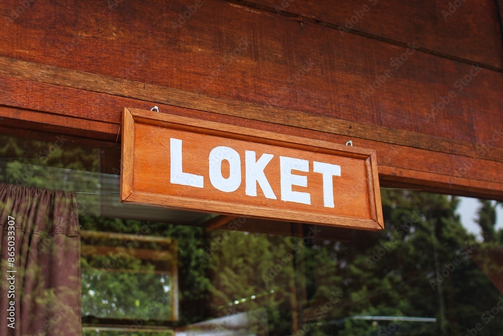 Ticket counter sign (Loket) at the entrance to the tourist area Stock ...