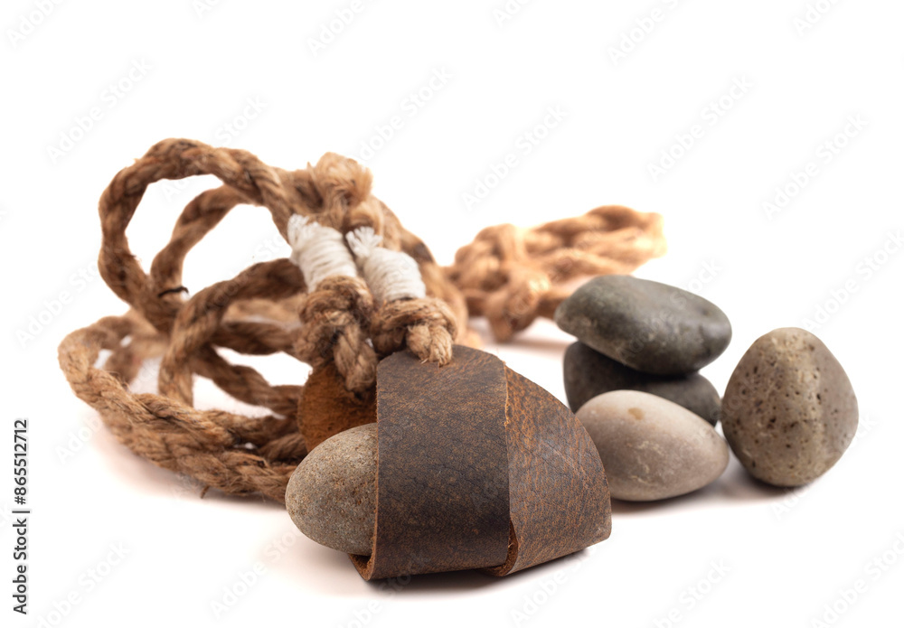 Poster Antique Sling Shot and Stones on a White Background from the ...